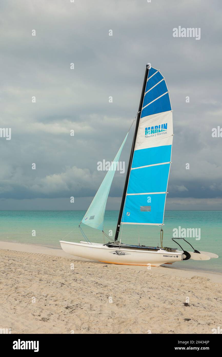 Sail boat on tropical beach with blue water background Caya Coco Cuba ...