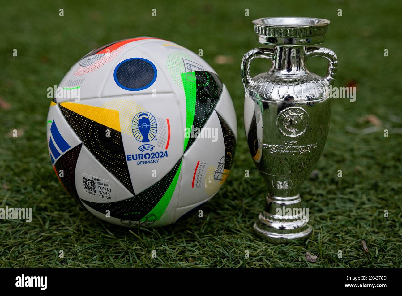 April 26, 2024, Berlin, Germany. The trophy and the official ball of ...