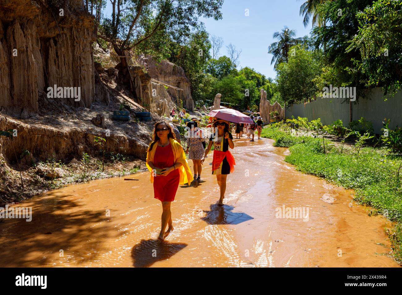 Tourists in the Fairy Stream of Mui Ne in Vietnam Stock Photo - Alamy