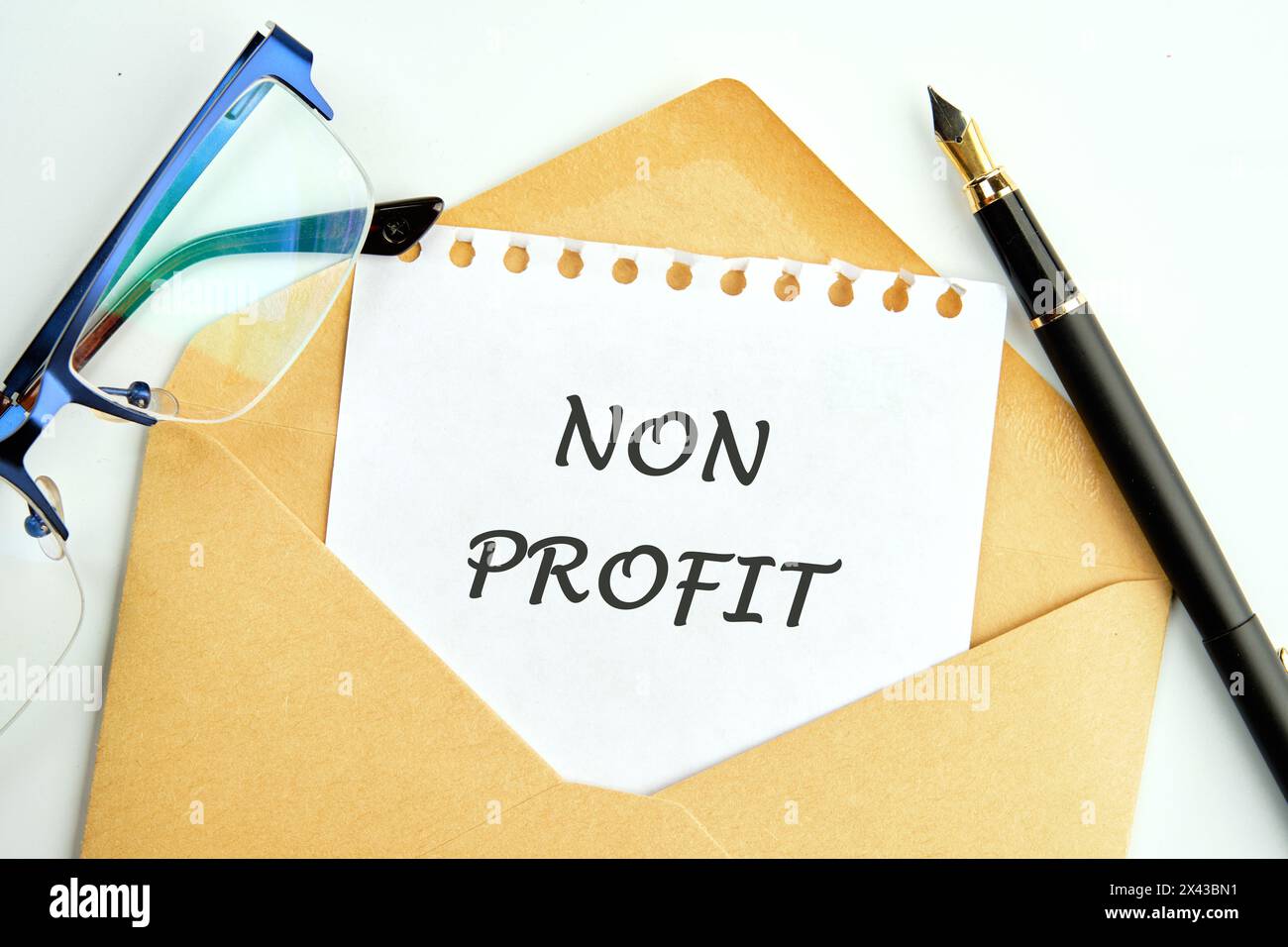 Non profit text an inscription on a piece of paper peeking out of an ...