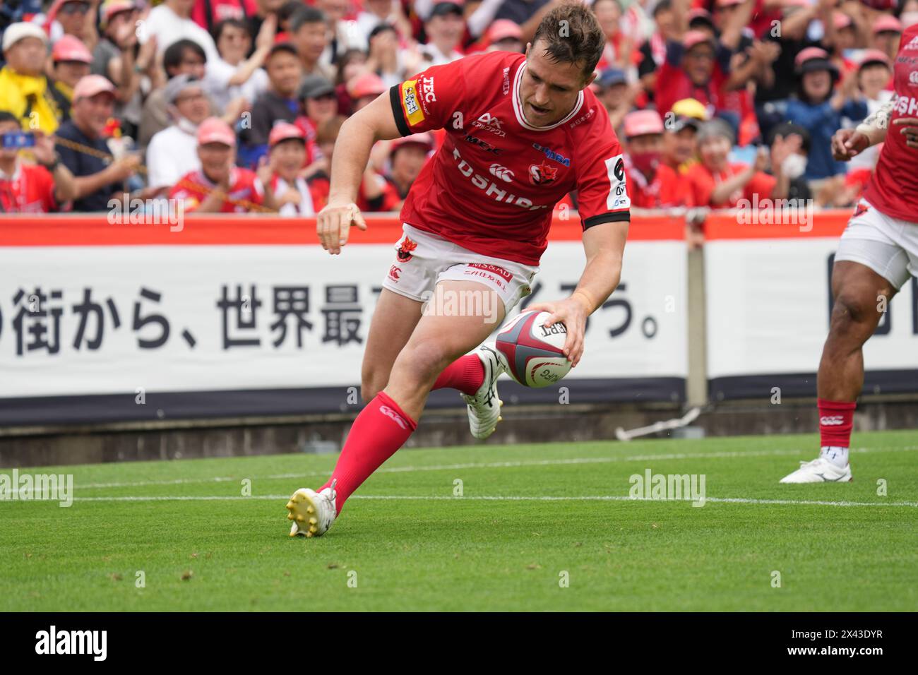 Brave Lupus' Michael Collins scores a try during the Japan Rugby League ...