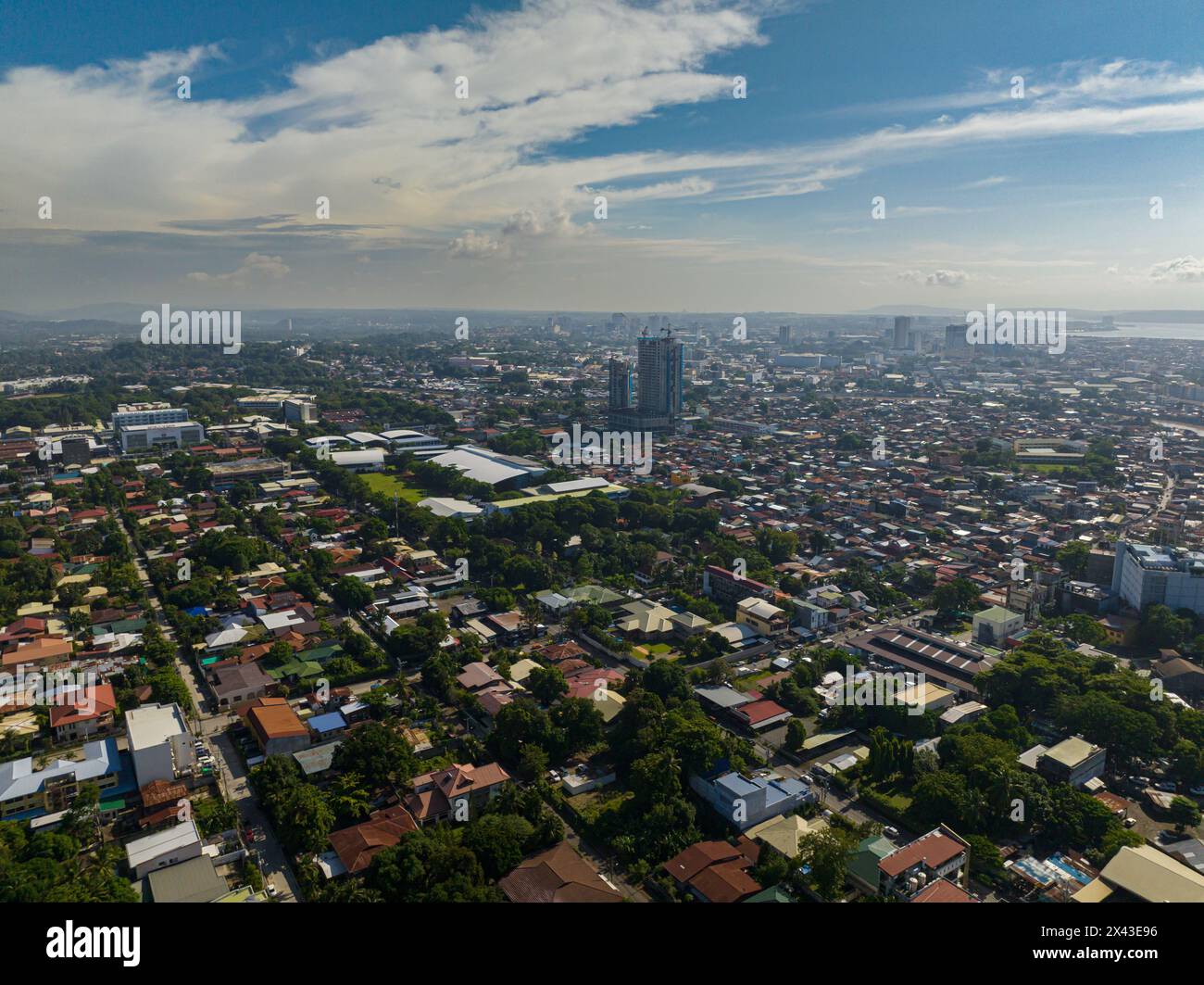 Modern buildings and residential area in Davao City. Small houses in ...