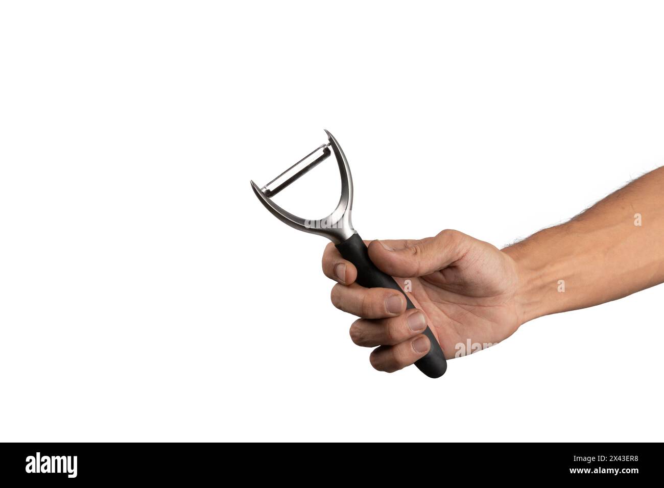 Black male hand holding a potato peeler isolated on white background ...