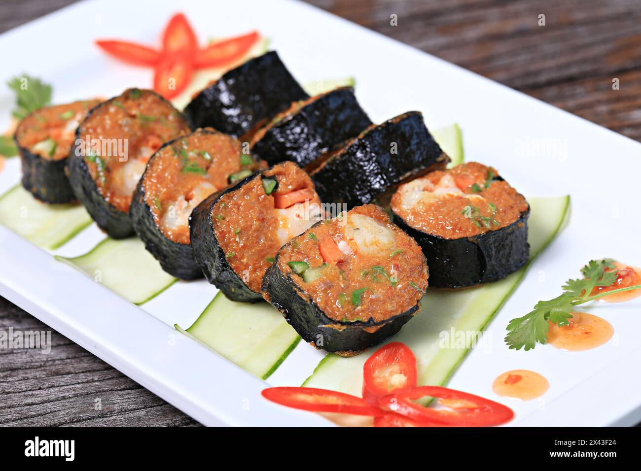 Fried fish cakes stuffed with fresh shrimp inside Wrapped in seaweed ...