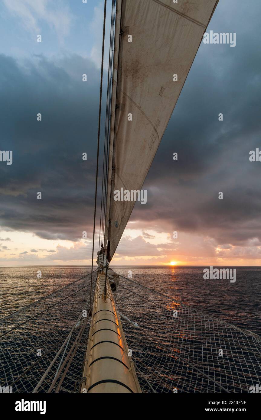 A view of the sunrise from the prow of a Star Clipper cruise ship ...