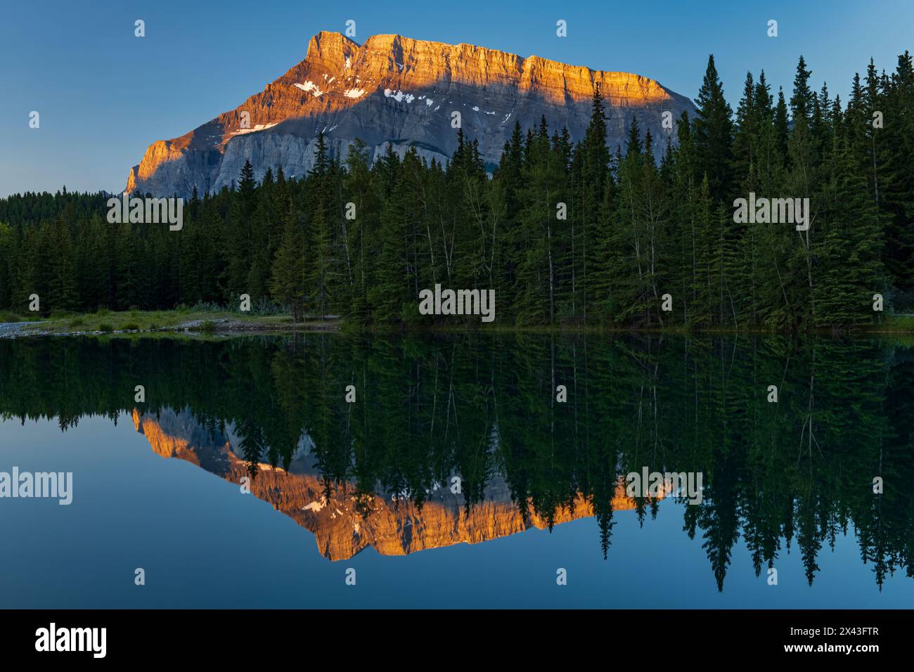 Canada, Alberta, Banff National Park. Mt. Rundle reflected in Cascade ...