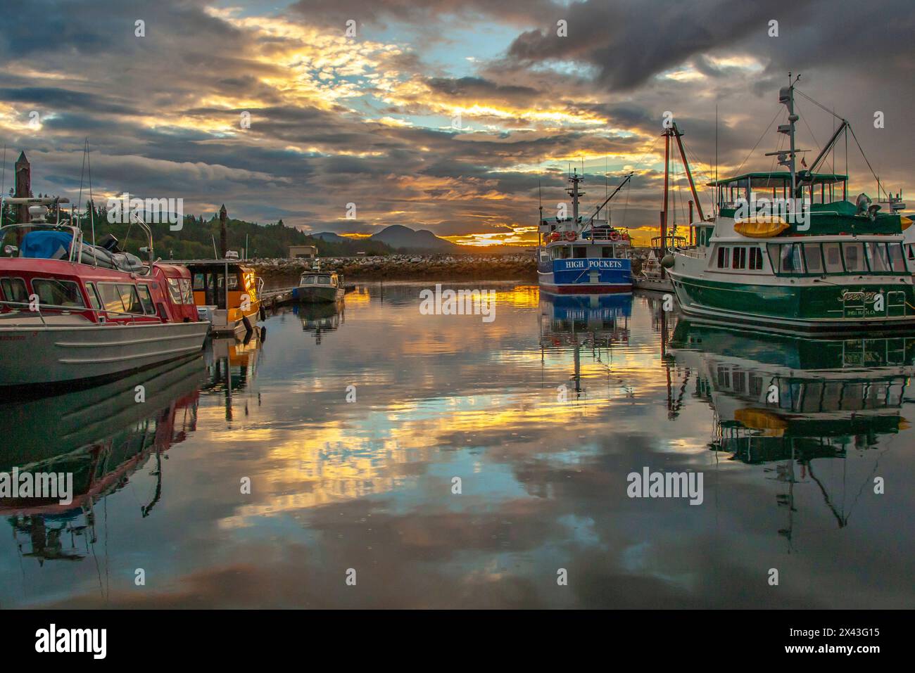 Canada, British Columbia, Inside Passage. Port McNeil marina at sunset. (Editorial Use Only ...