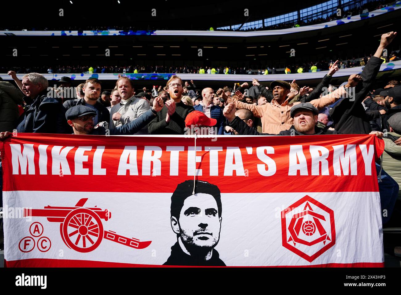 Arsenal fans show their support in the stands during the Premier League ...