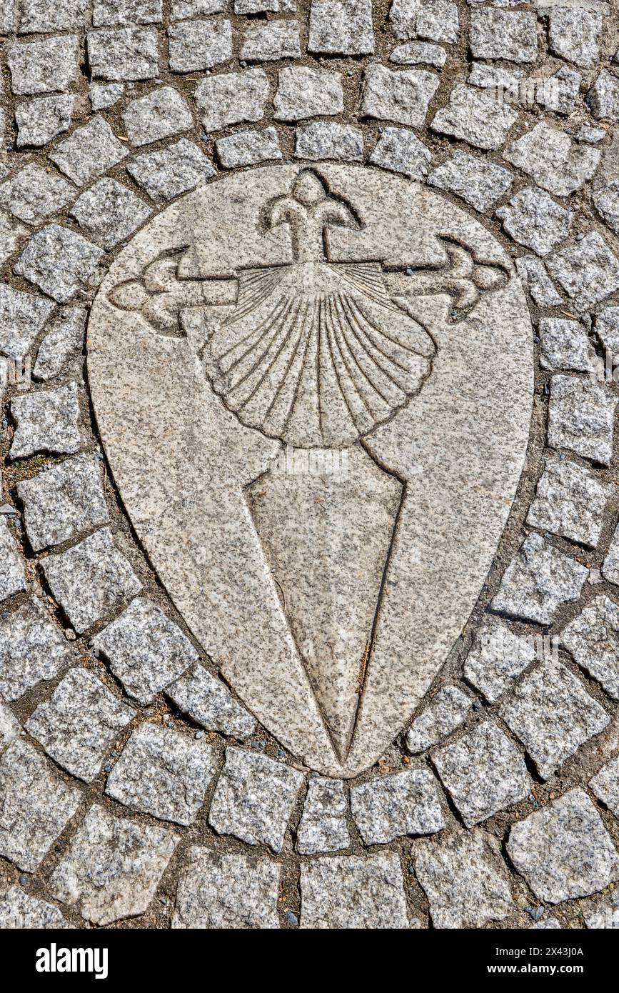 Spain, Galicia. Sword of the Knights Templar and clam shell in the path ...