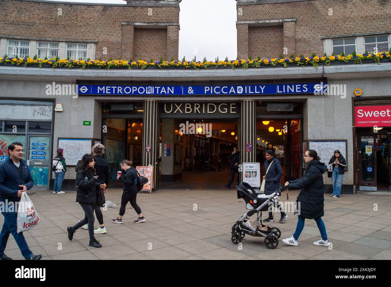 Uxbridge, UK. 27th April, 2024. Shoppers out and about in Uxbridge ...
