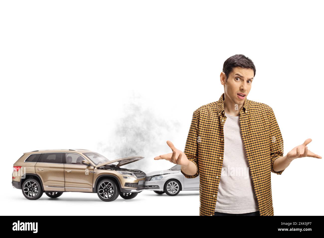 Confused young man and a car crash isolated on white background Stock ...
