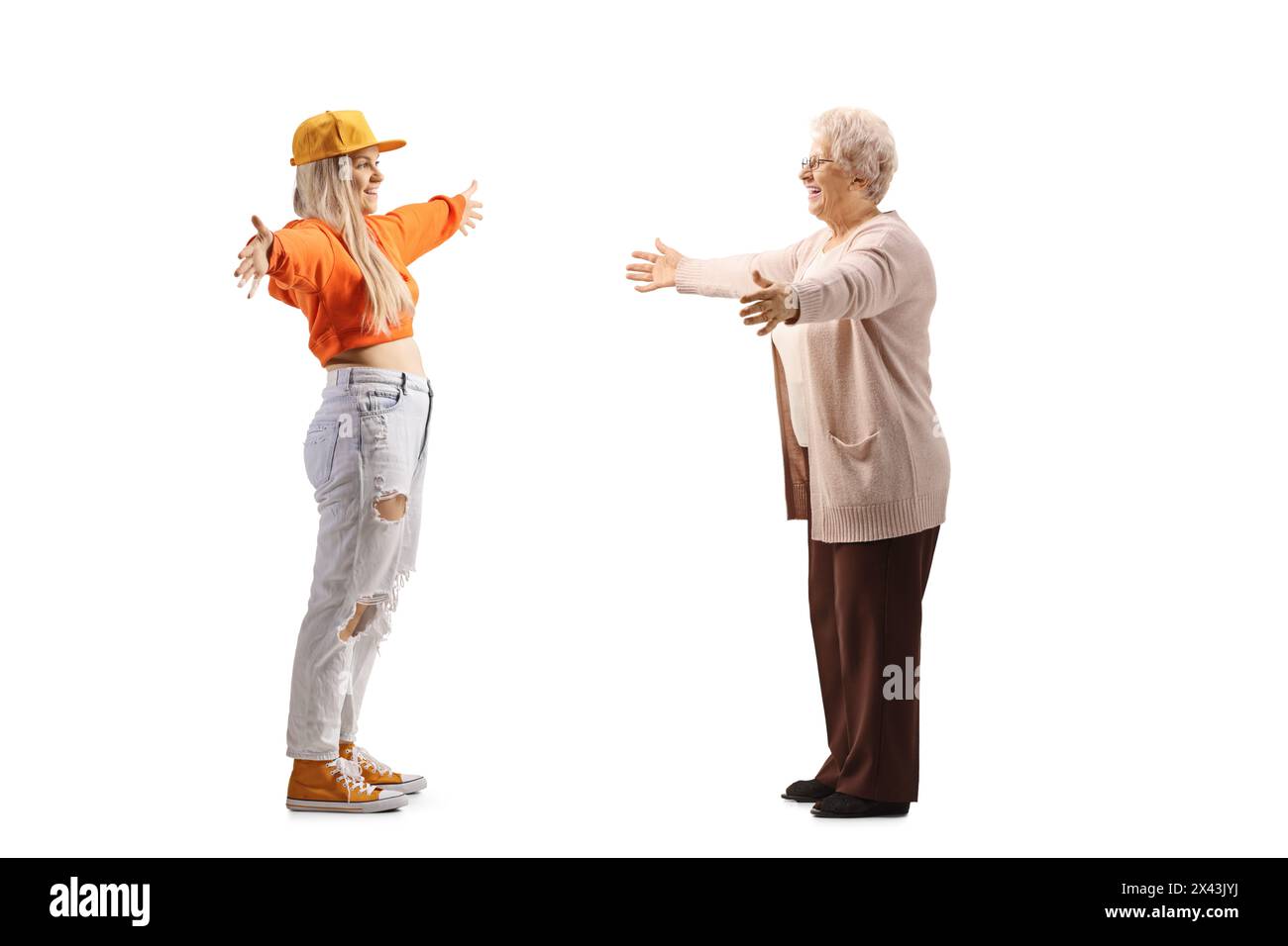 Full length profile shot of Santa Claus meeting a teenage female ...