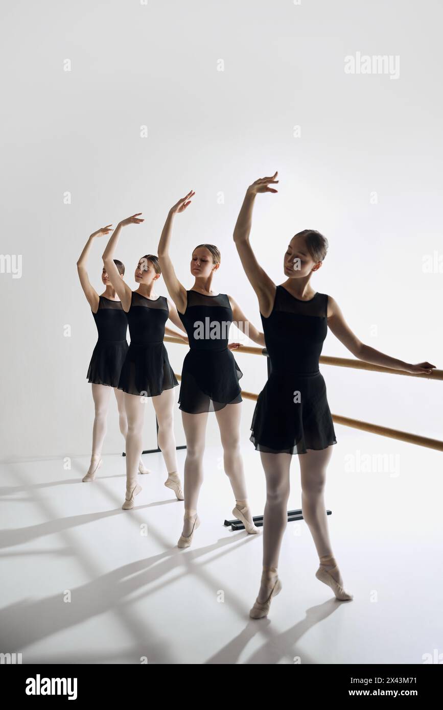 The art of ballet dance. Four graceful teen girls, ballet dancers ...