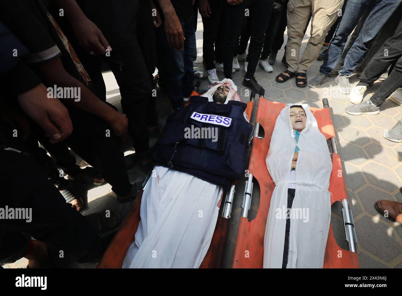 Relatives, loved ones and colleagues of Al-Quds El-Youm TV anchor ...