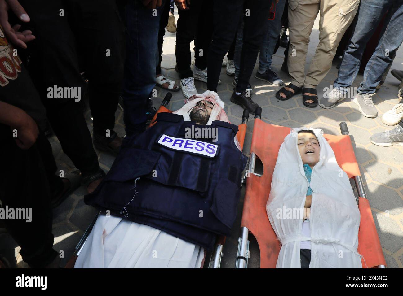 Relatives, loved ones and colleagues of Al-Quds El-Youm TV anchor ...