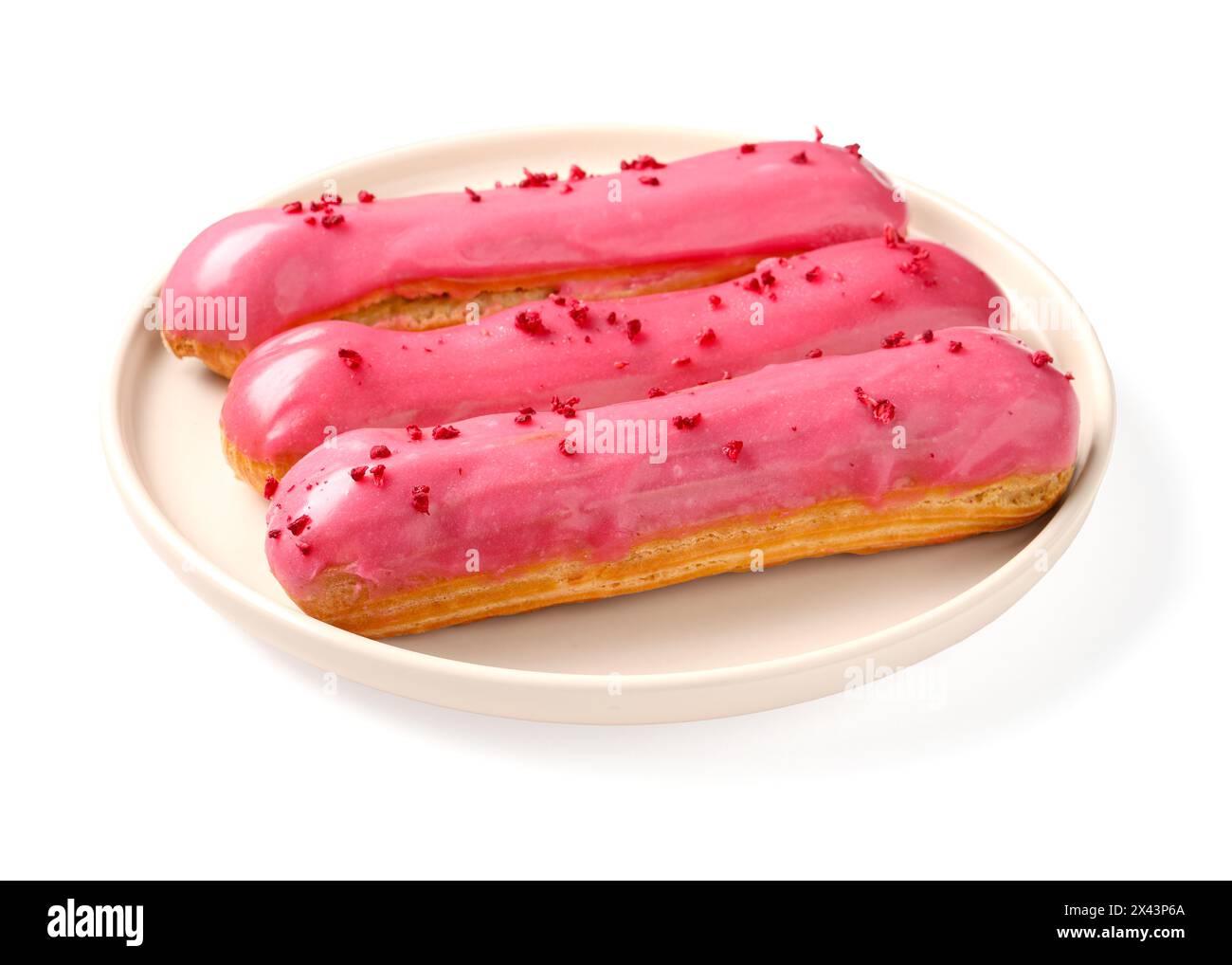 Delicious eclairs covered with pink glaze isolated on white Stock Photo ...