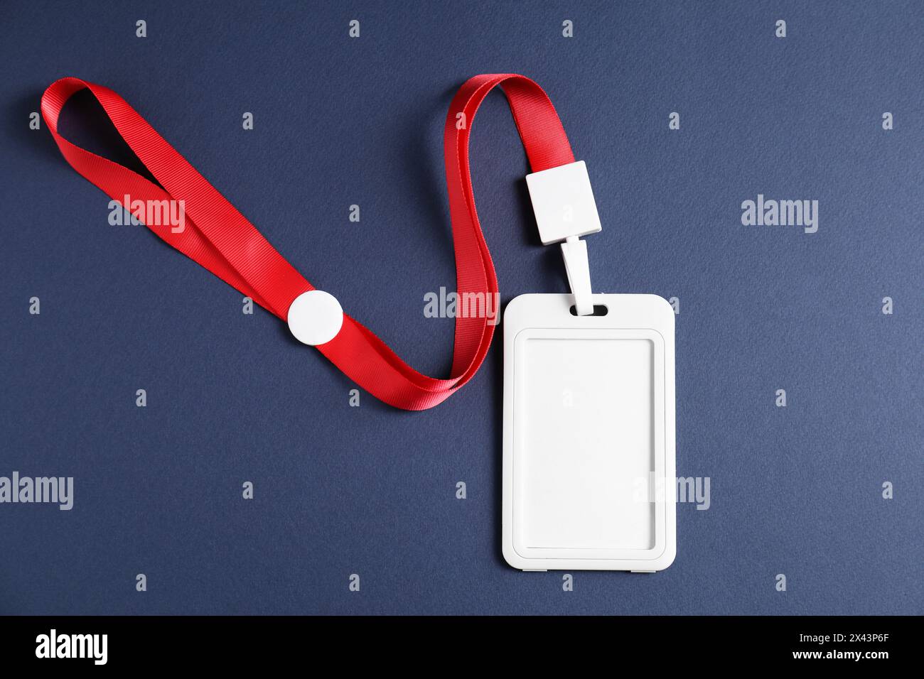Blank badge with string on blue background, top view Stock Photo - Alamy