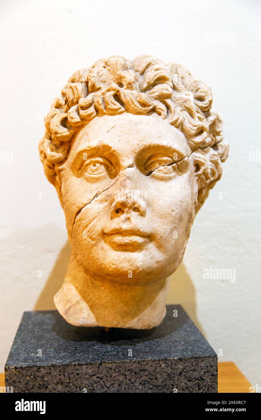 Carved marble Roman portrait head of a young man, archaeology museum ...