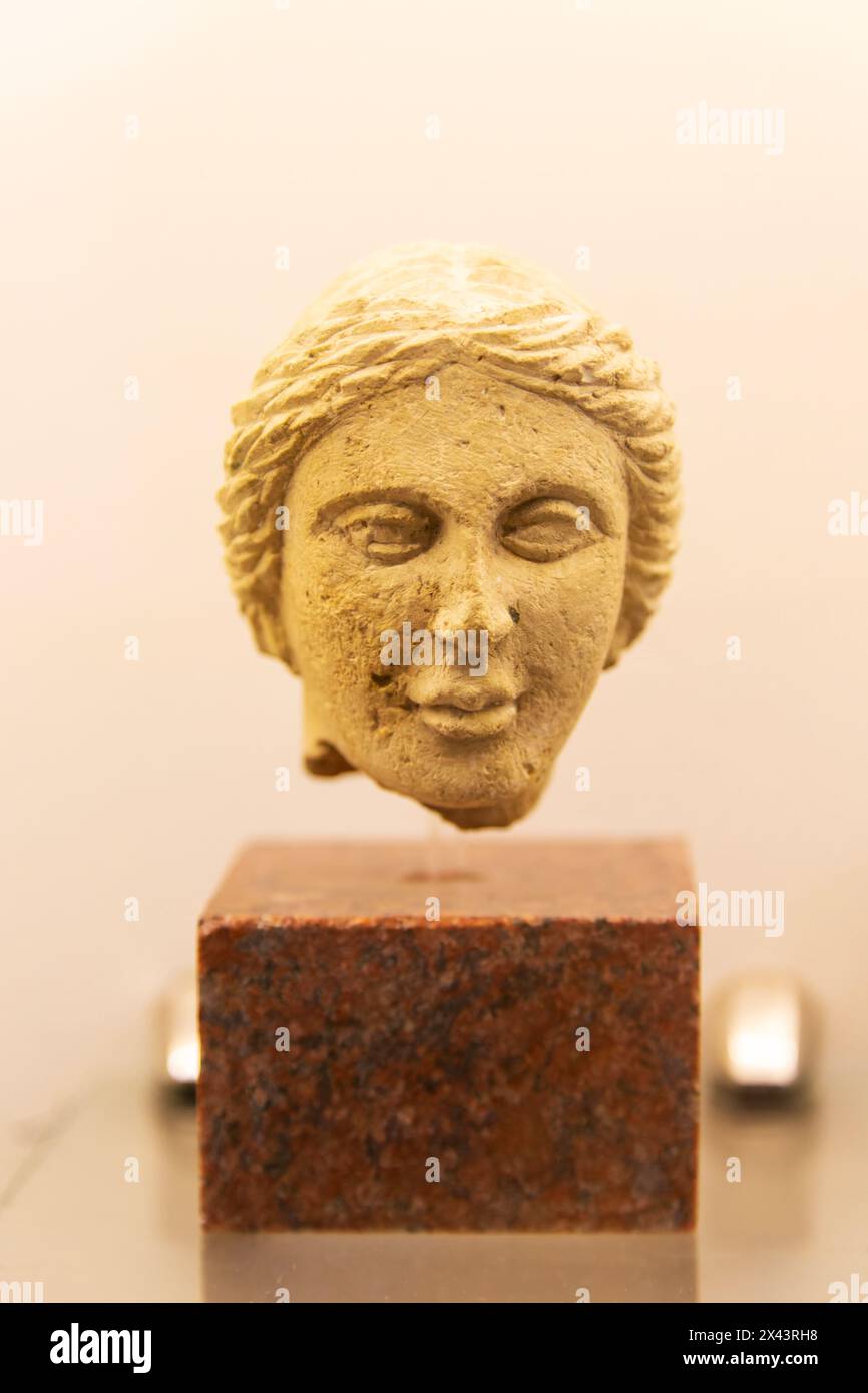 Carved head portrait of young woman, archaeology museum, Apollonia ...
