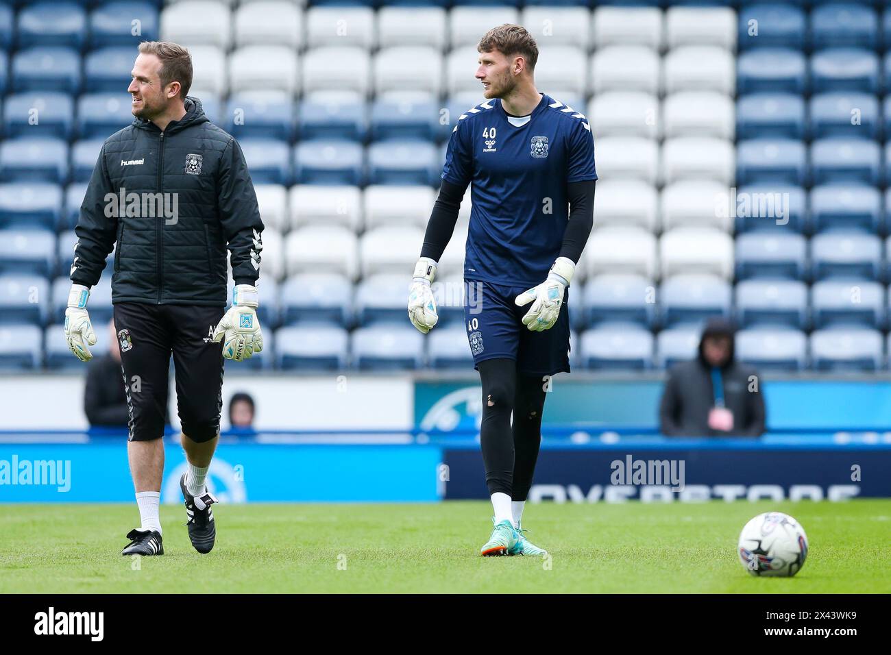 Coventry City goalkeeper Bradley Collins (right) during the pre-match ...