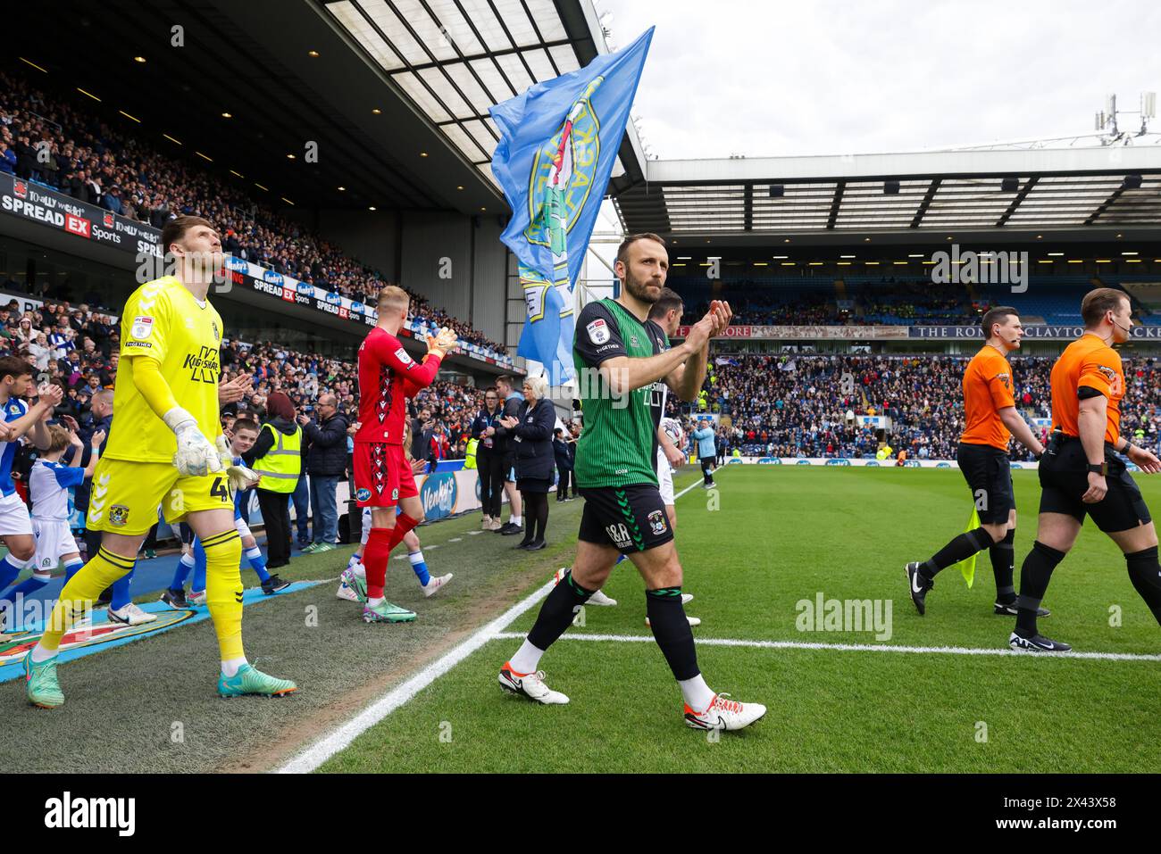 Coventry City's Liam Kelly and goalkeeper Bradley Collins make their ...