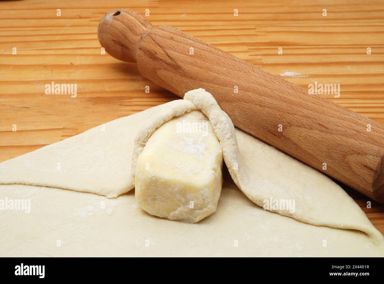 Folded Raw Puff Pastry Dough. Shown from above on a wooden cutting ...