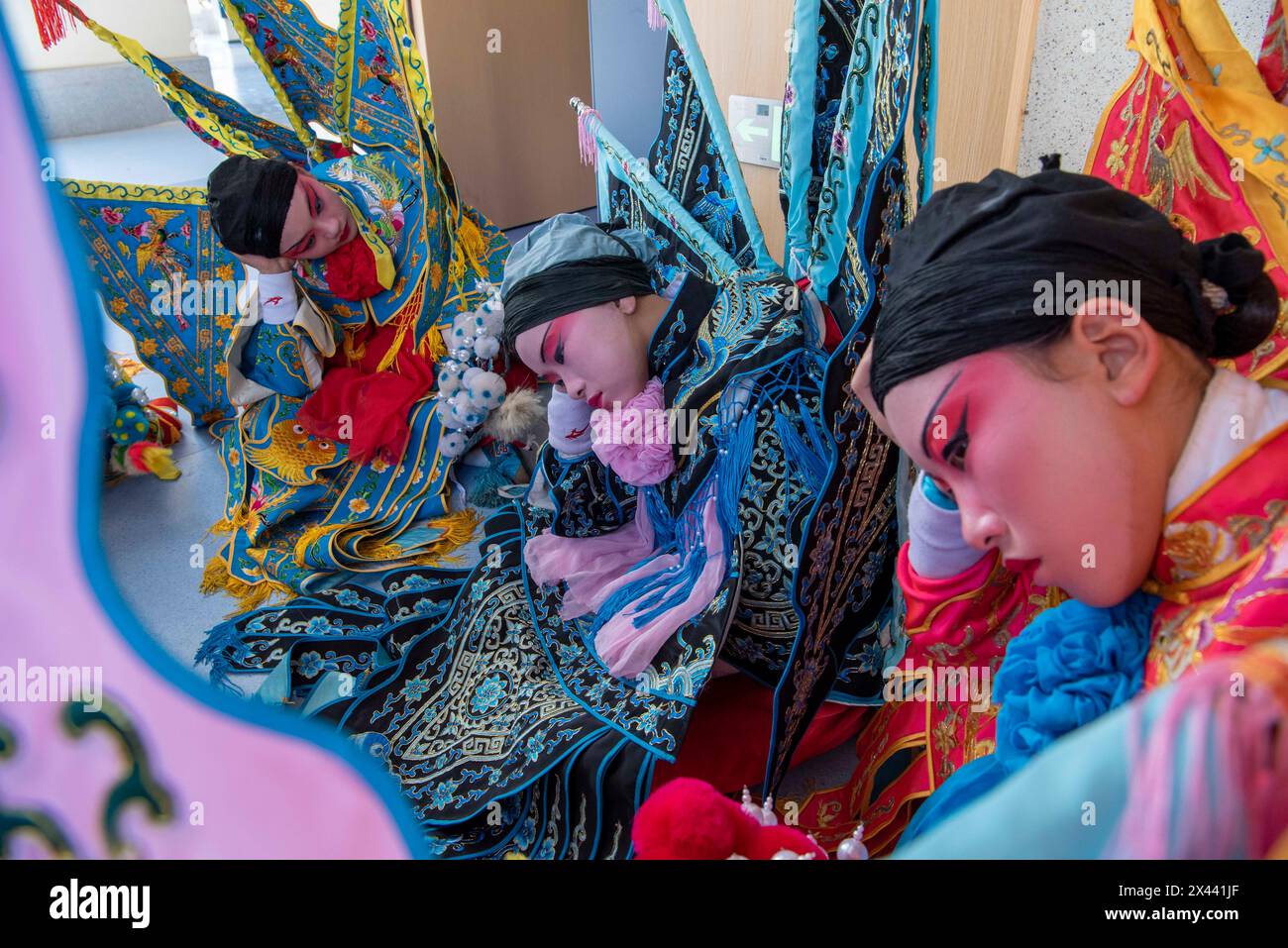 A young actor in a Peking Opera club is feeling uncomfortable after ...
