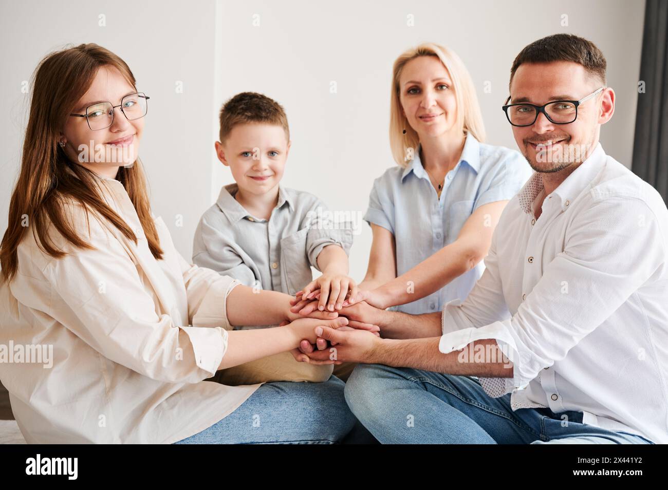 Emotional family kids holding hi-res stock photography and images - Alamy