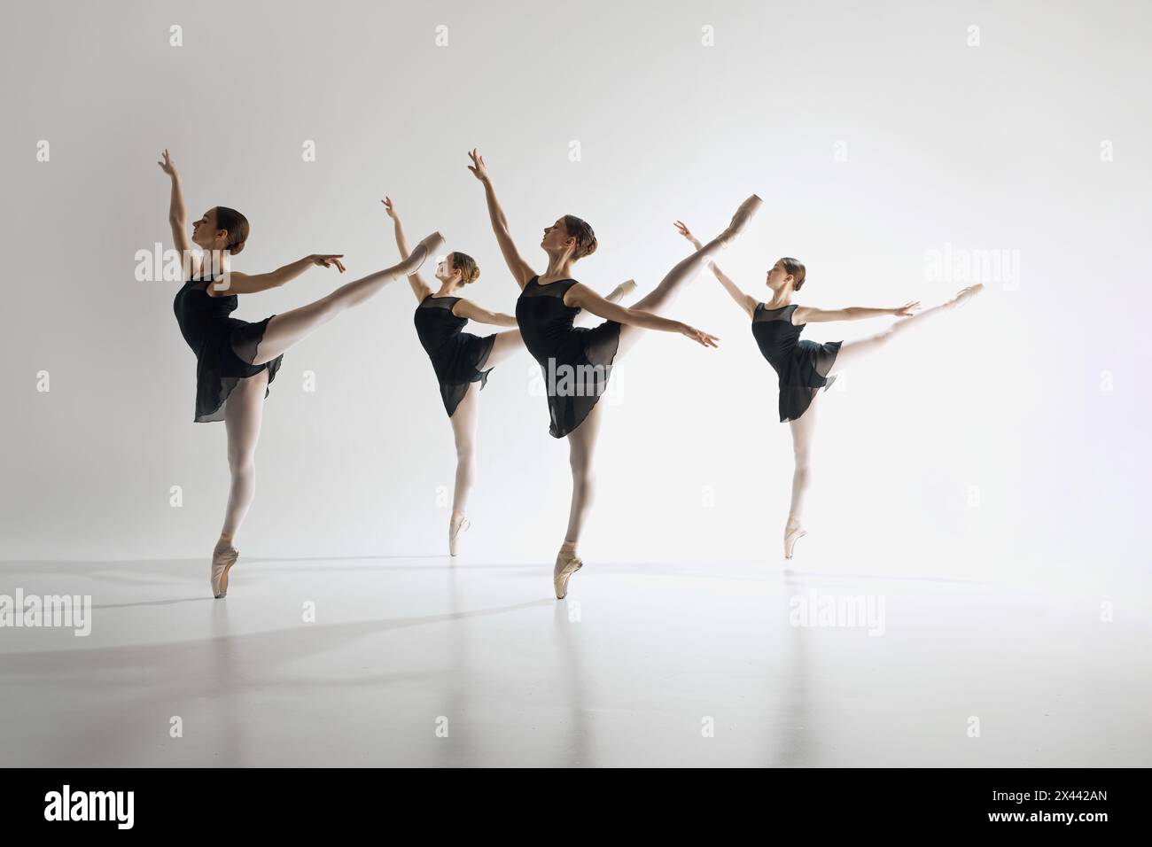 Inspiration. Young teen girls, graceful ballerinas in back costumes ...