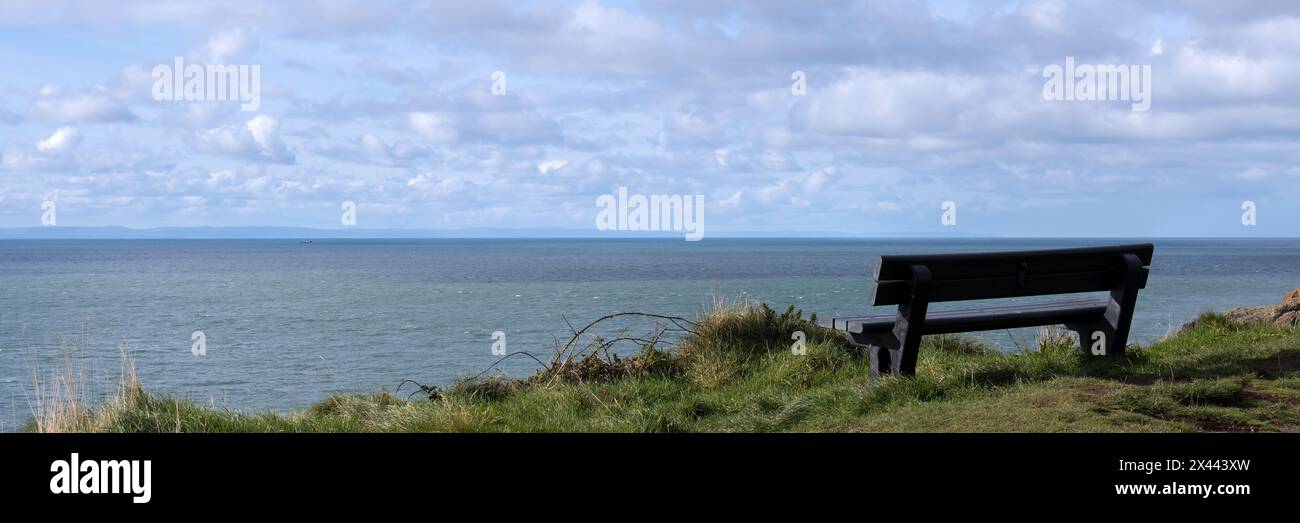 Portpatrick bench on cliff near sea, Dumfries and Galloway, Scotland ...