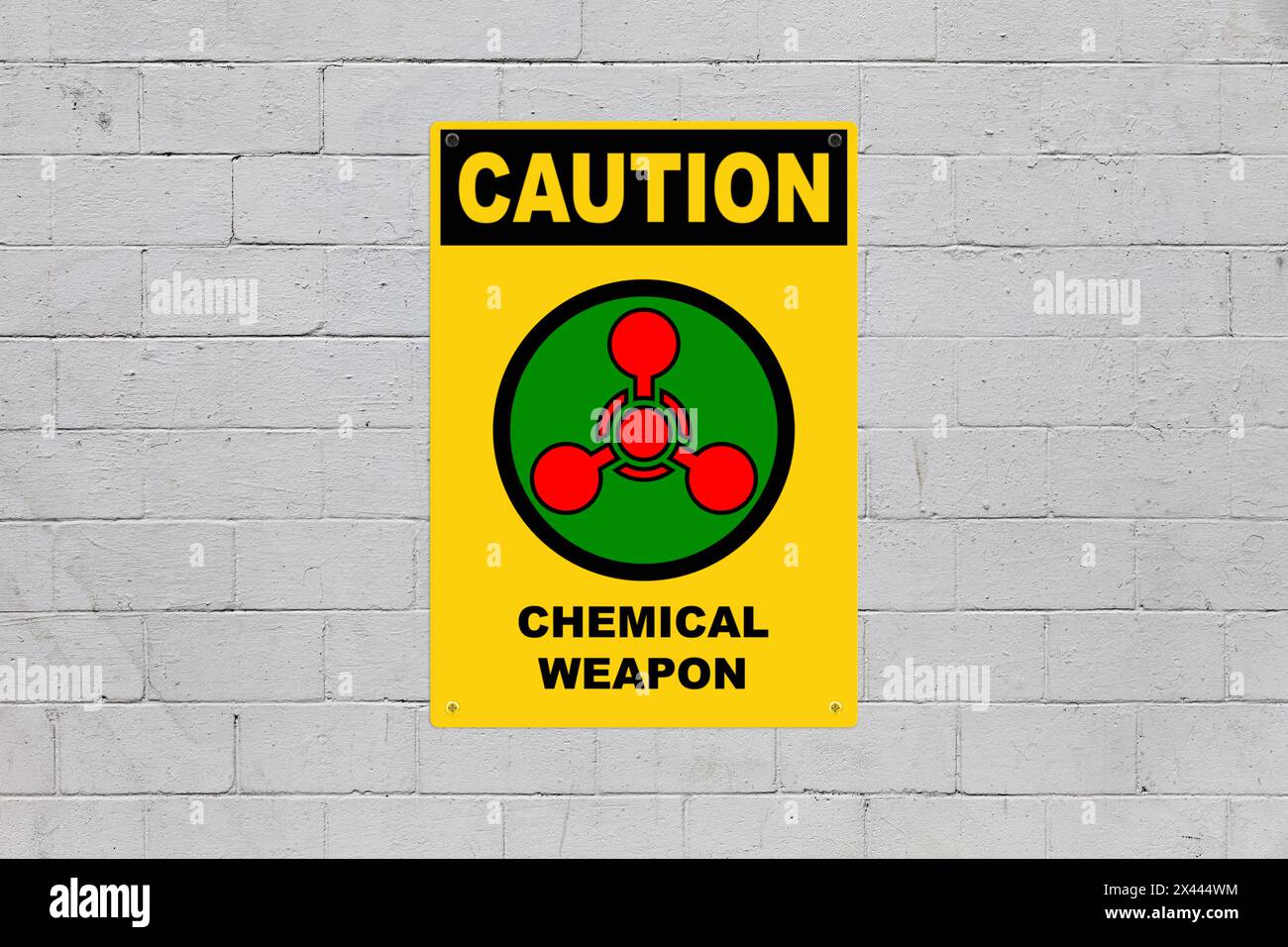 Yellow warning sign screwed to a cinder block wall to warn about a ...