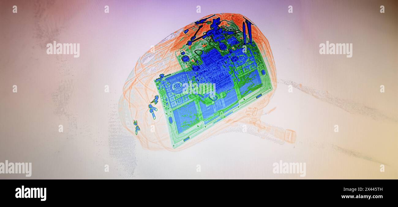 Passenger baggage inspection x-ray screen Stock Photo - Alamy