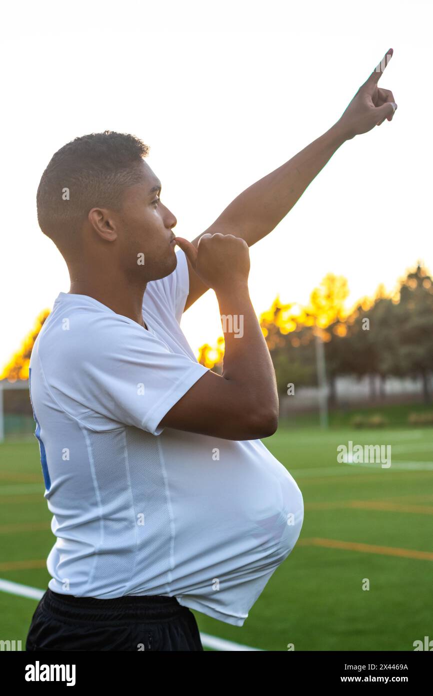 Celebration a goal. Soccer player doing throw-in Stock Photo - Alamy