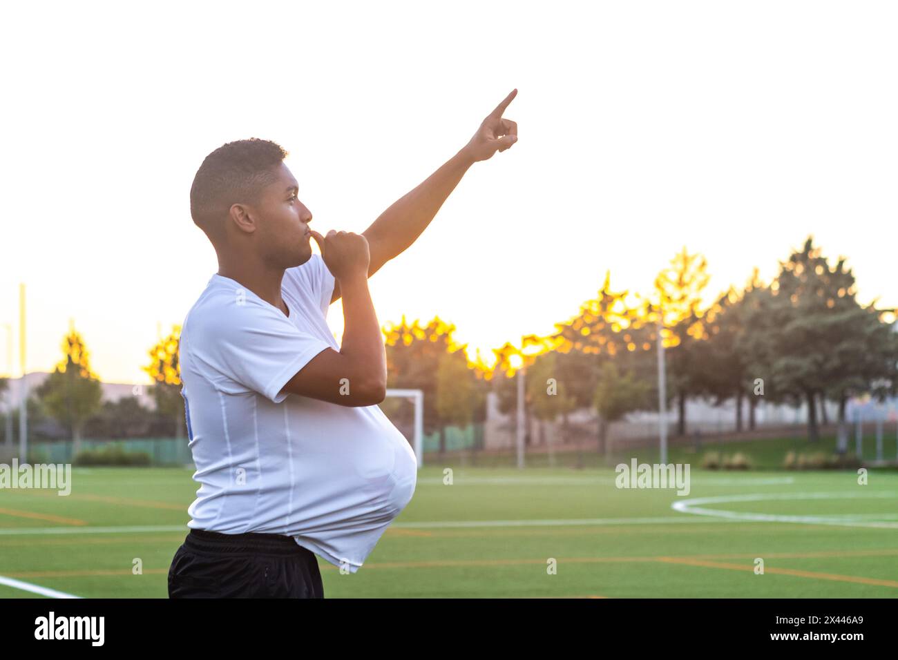 Celebration a goal. Soccer player doing throw-in Stock Photo - Alamy
