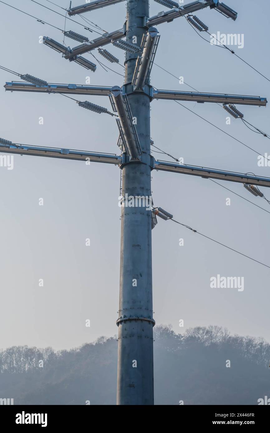 Closeup of large futuristic looking cable transition electrical tower ...