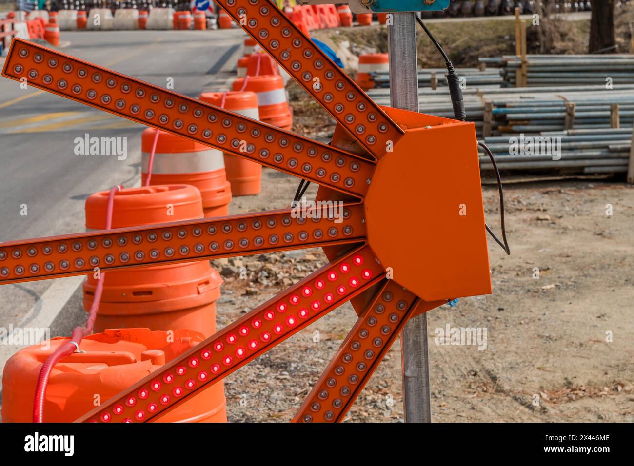 Fan shaped LED construction warning light on rural roadside next to ...