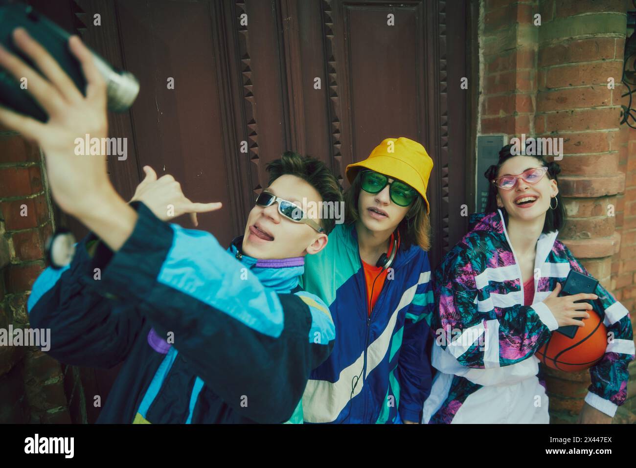 Boy filming friends hi-res stock photography and images - Alamy