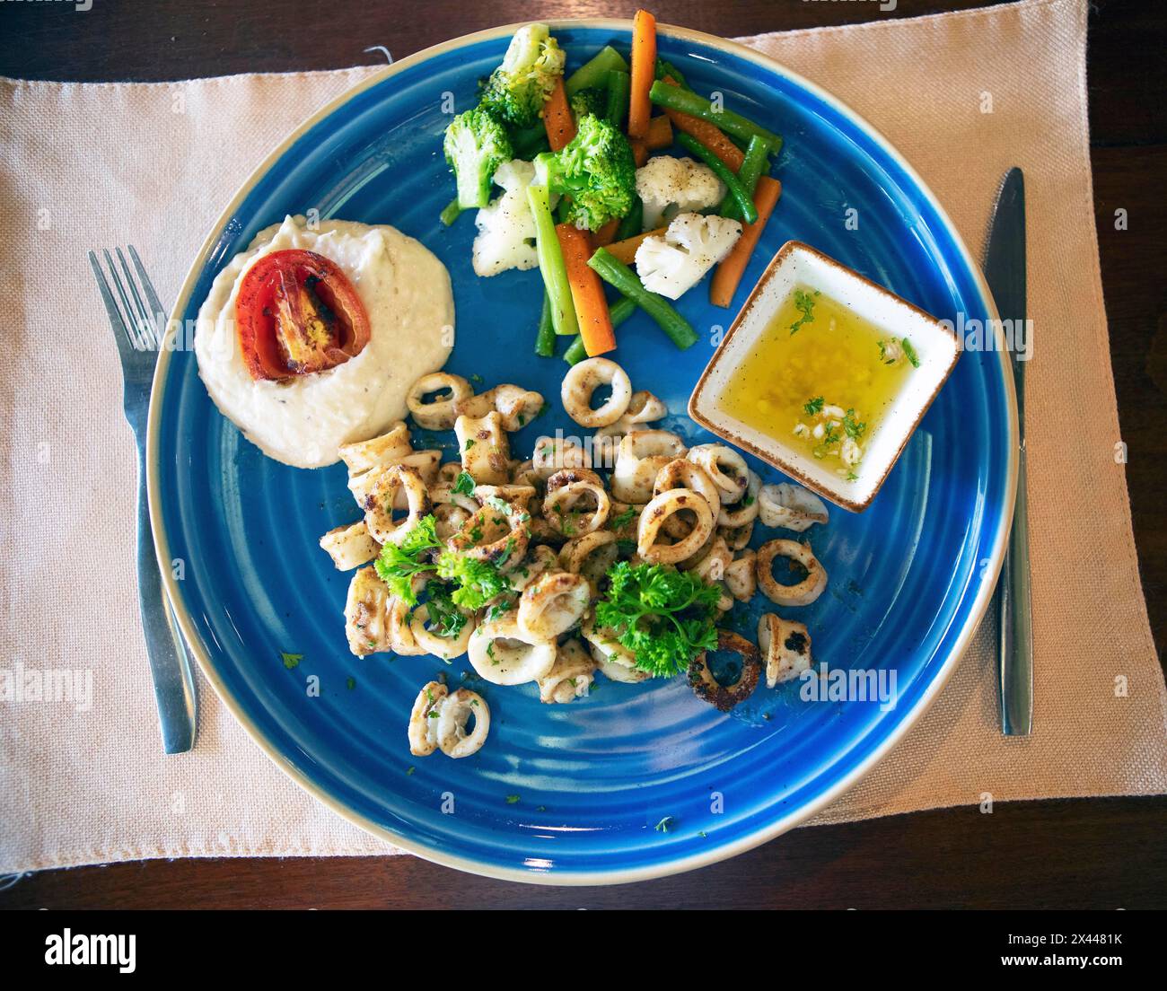 Grilled squid rings, typical Kerala dish, Kerala, India Stock Photo - Alamy