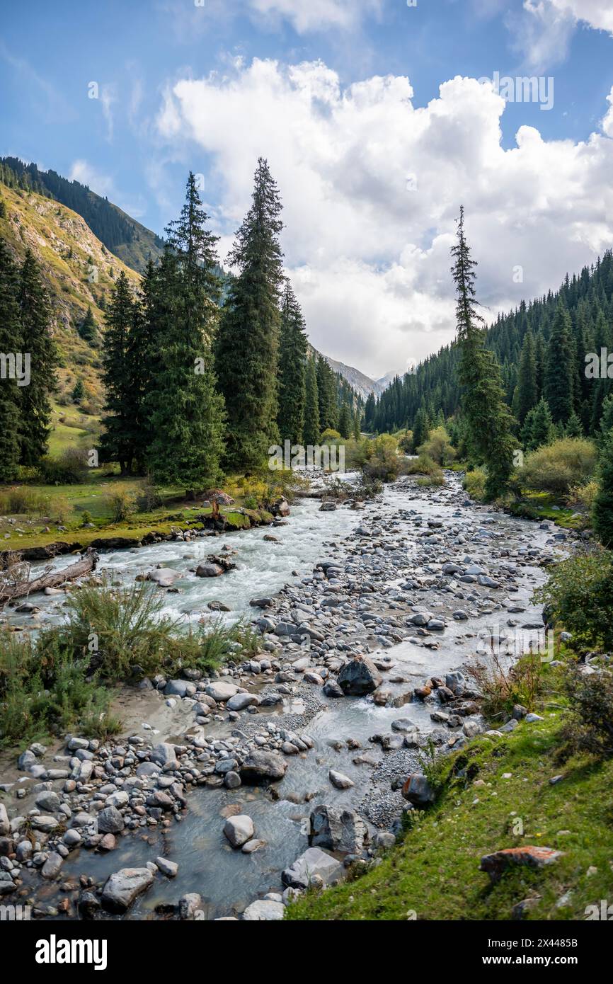 Green mountain valley with river and steep mountain peaks, Chong Kyzyl ...