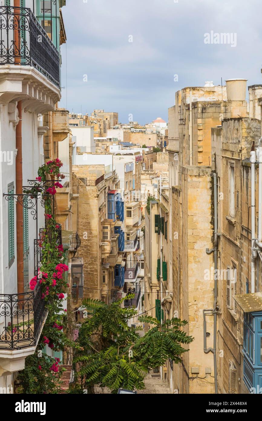 Old architectural apartment buildings with Maltese balconies, Valletta ...