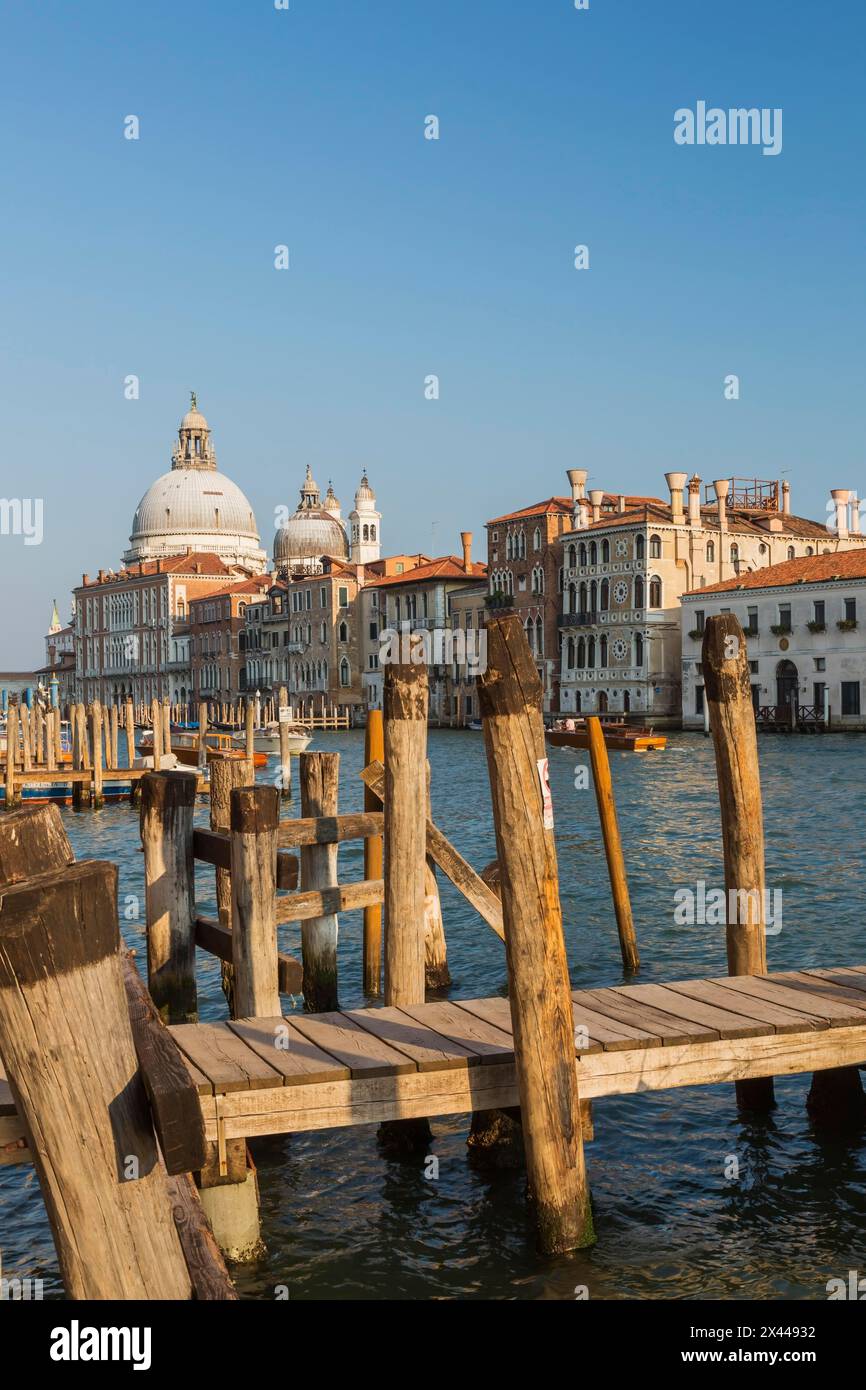 Trinita pier and mooring posts on Grand Canal with Renaissance ...