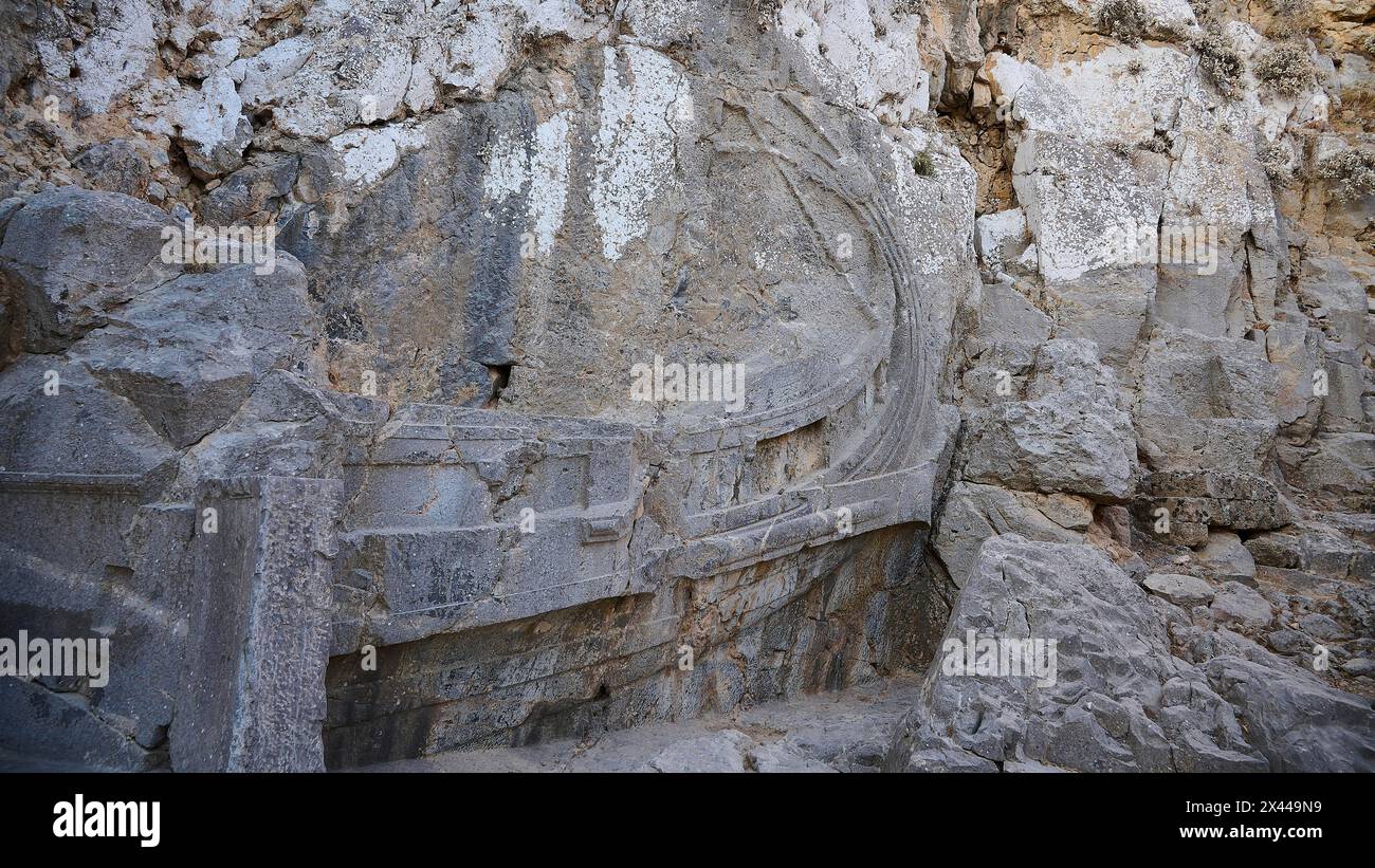 At the entrance to the Acropolis, The ruins of an ancient stone ...