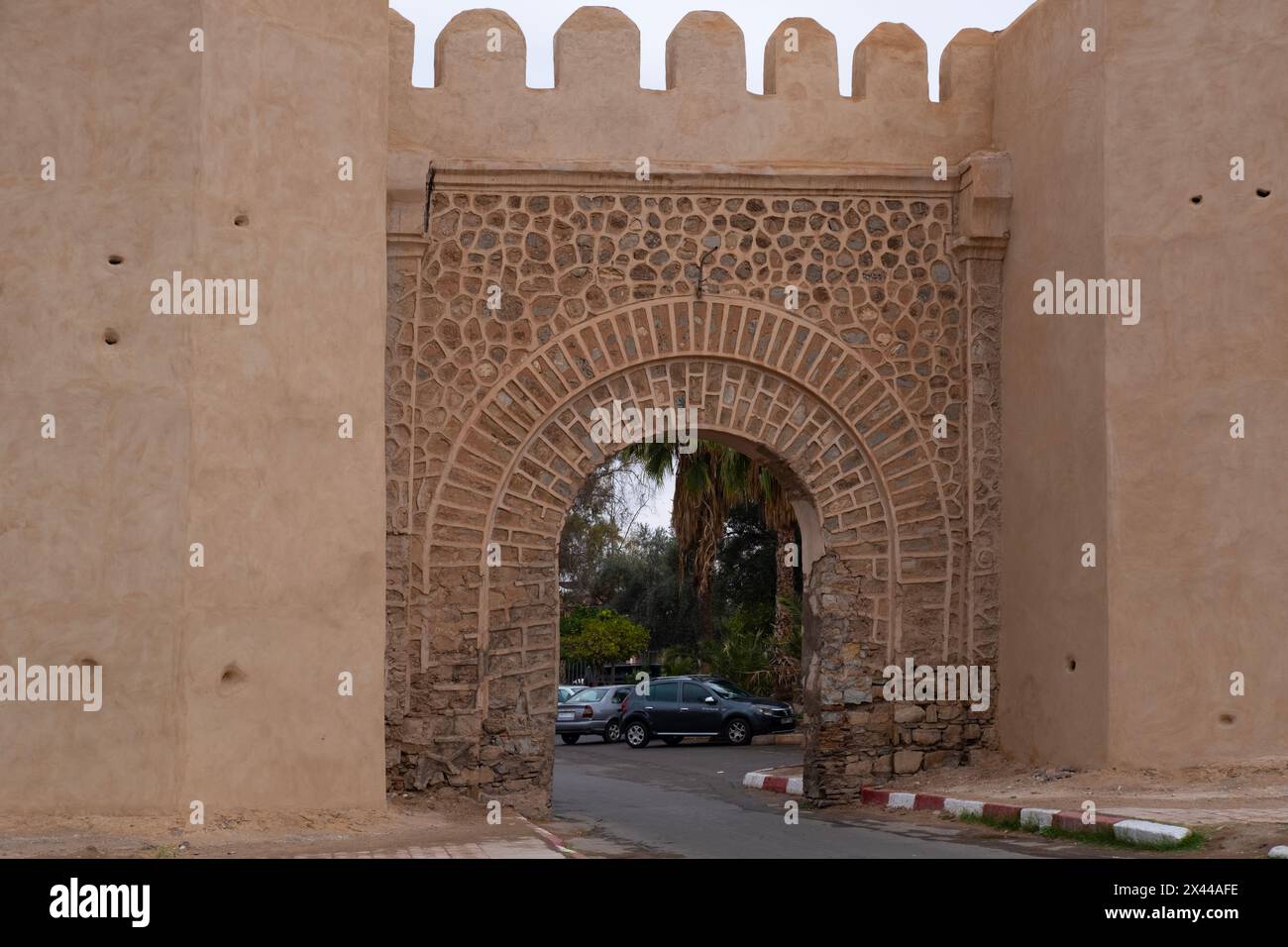 old fortress wall with gate, Authentic details traditional Moroccan ...