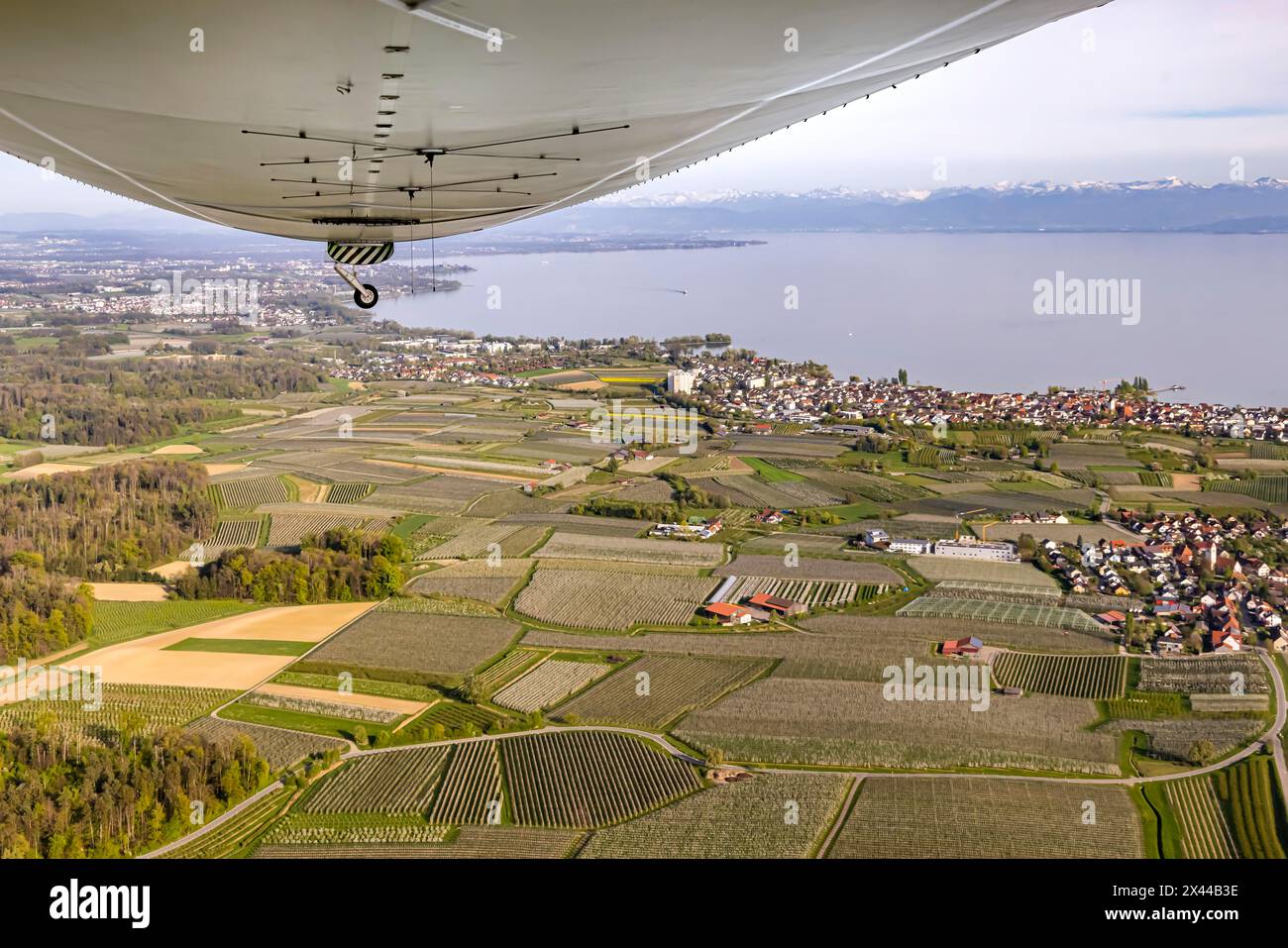 Flight in a zeppelin along the shore of Lake Constance, aerial view ...