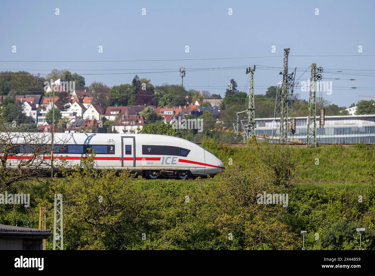Deutsche Bahn AG InterCityExpress ICE en route, railway embankment and ...