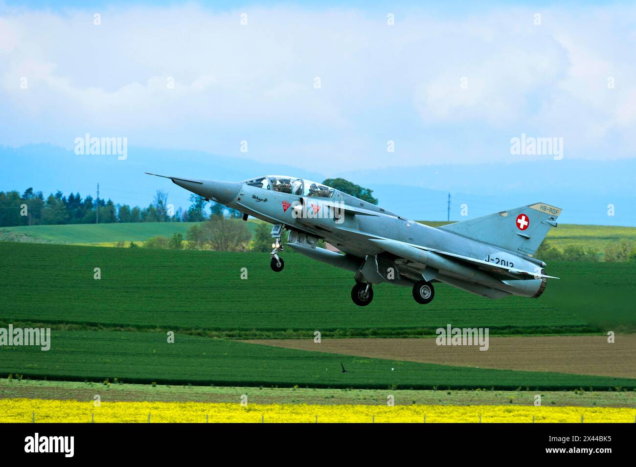 Swiss Air Force Mirage IIIDS two-seater fighter aircraft climbing ...