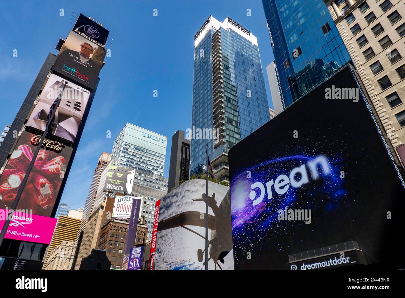 Times Square buildings are covered with bright electronic billboards 24 ...