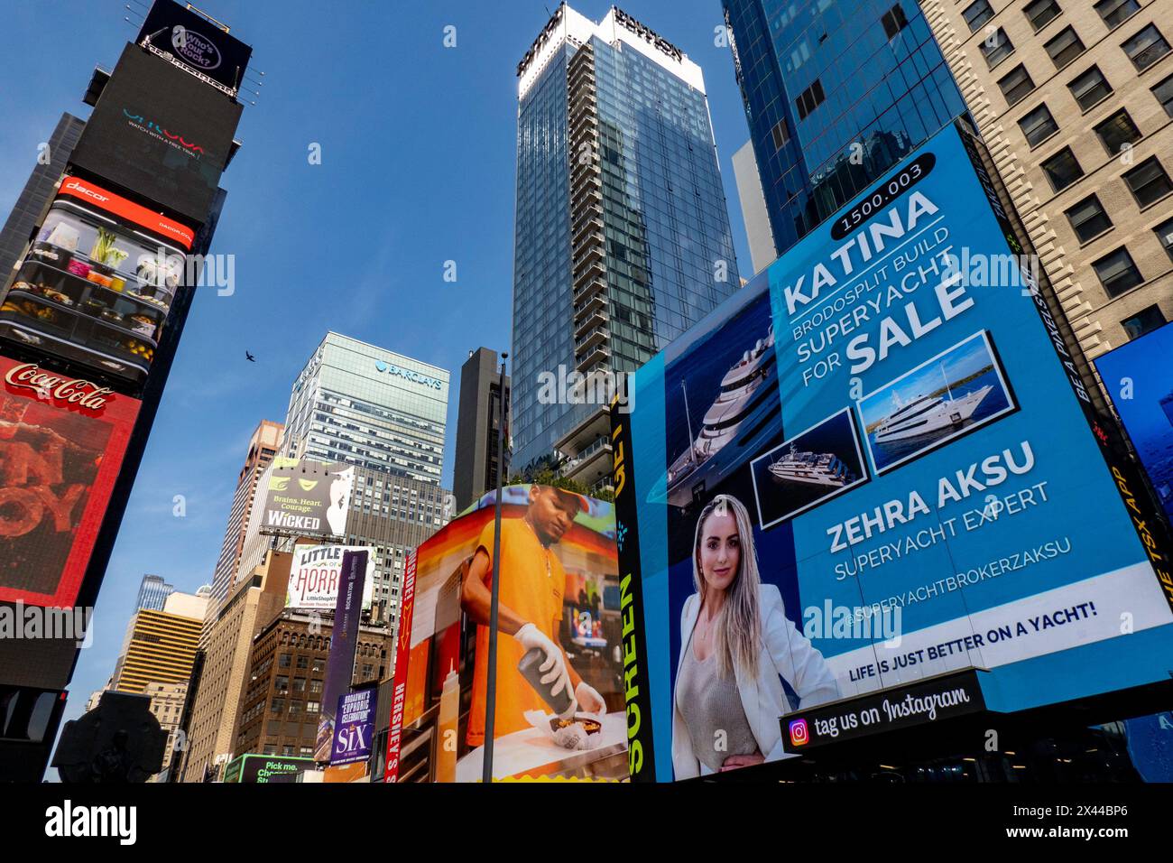 Times Square buildings are covered with bright electronic billboards 24 ...