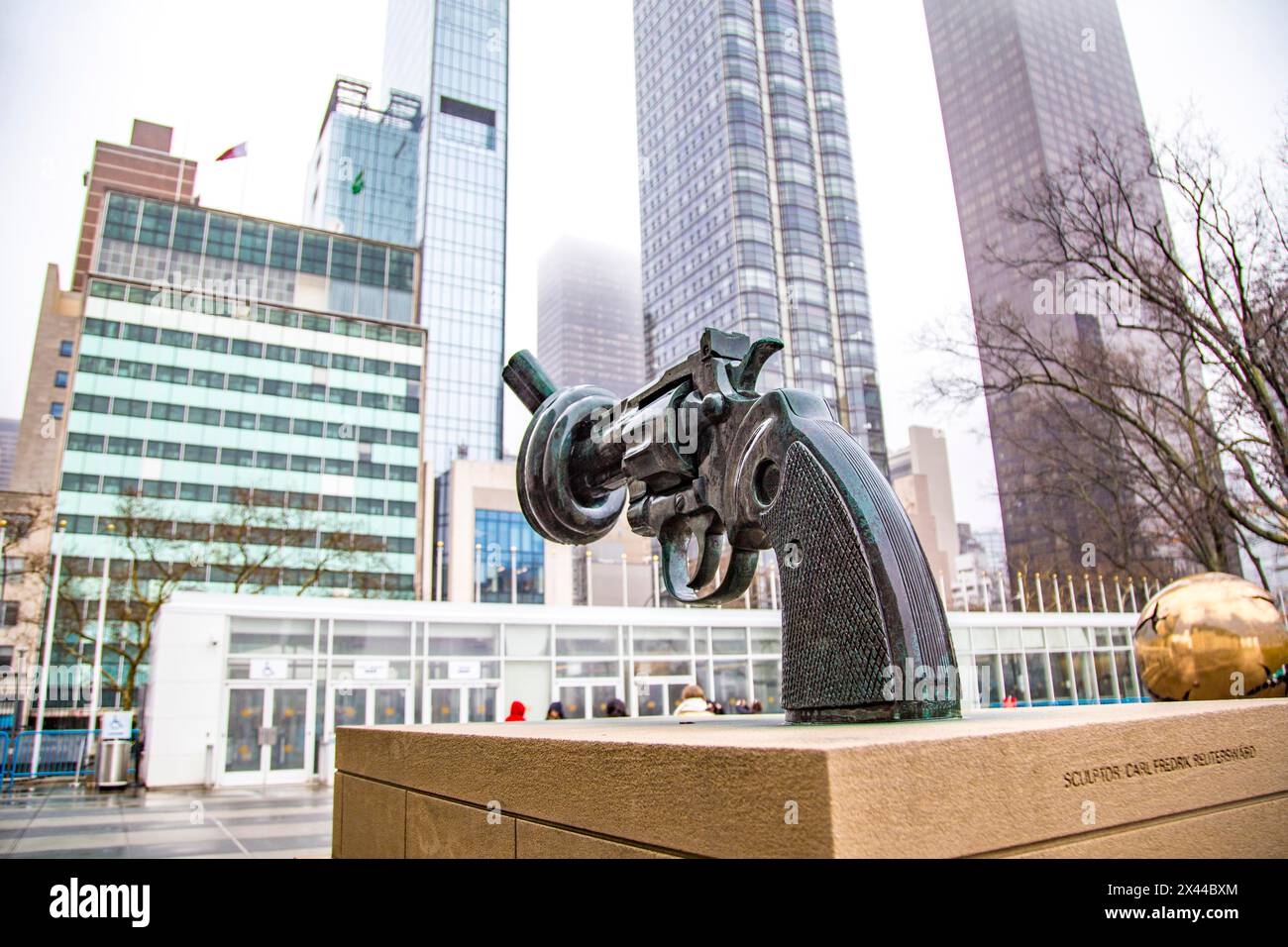 Gun sculpture Non Violence in front of the UN headquarters in New York ...