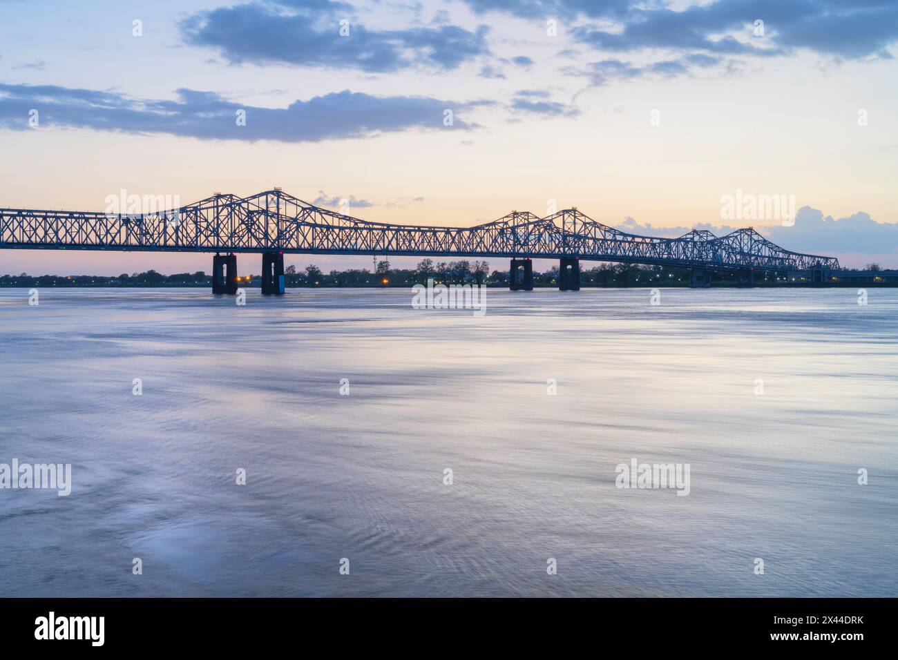 Natchez-Vidalia Bridge over the Mississippi River after sunset. Seen ...